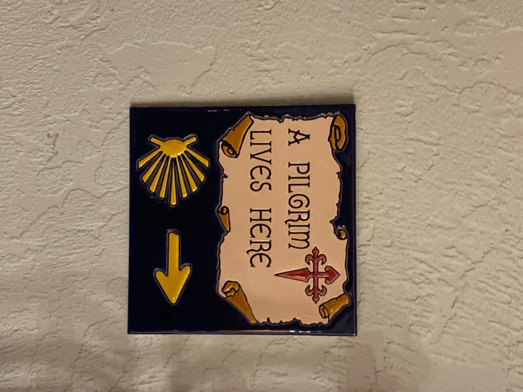 "A Pilgrim Lives Here" tile